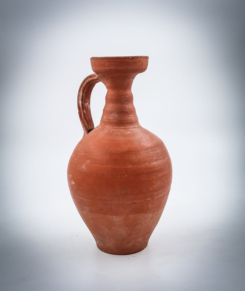 A NORTH-AFRICAN RED-SLIP TERRACOTTA DECANTER – The Oriental Museum